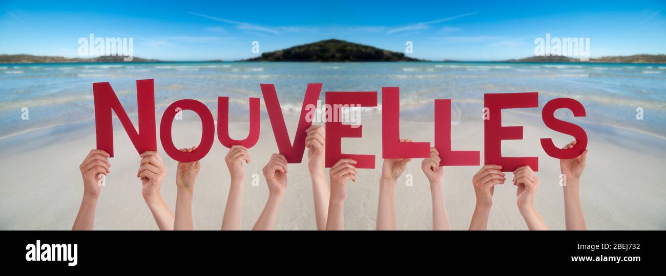 People Hands Holding Word Nouvelles Means News, Ocean Background Stock ...