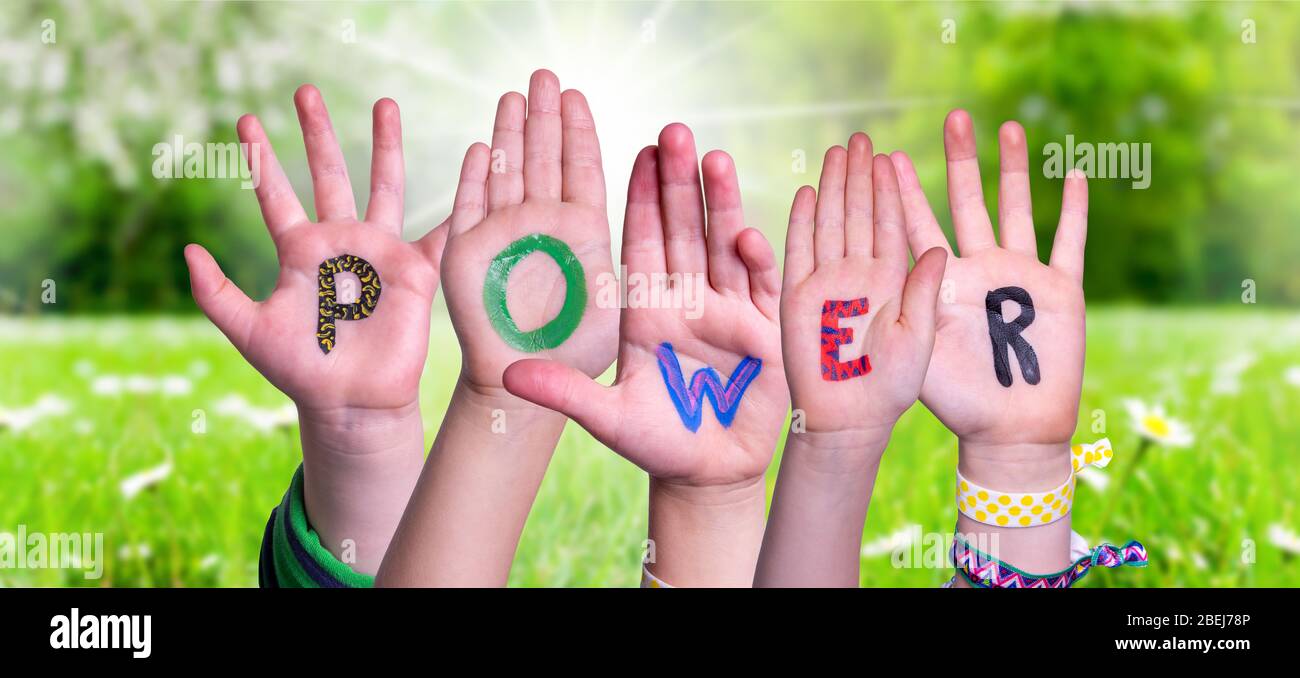 Children Hands Building Word Power, Grass Meadow Stock Photo - Alamy