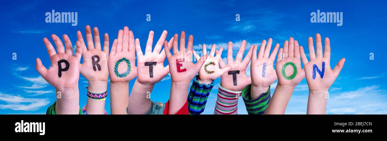 Kids Hands Holding Word Protection, Blue Sky Stock Photo - Alamy