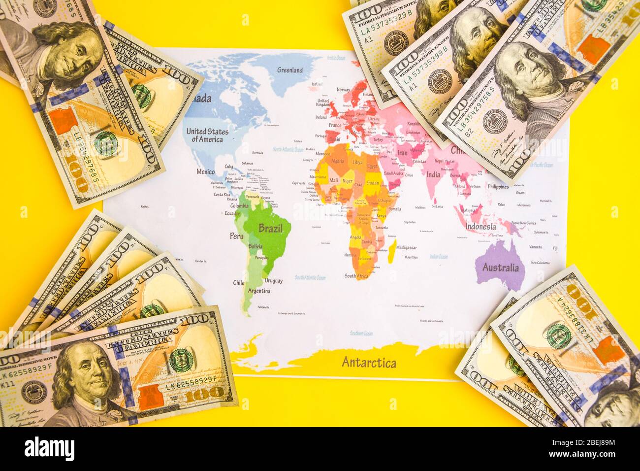 Pile of dollars near USA on world map, money, dollar and world map view ...