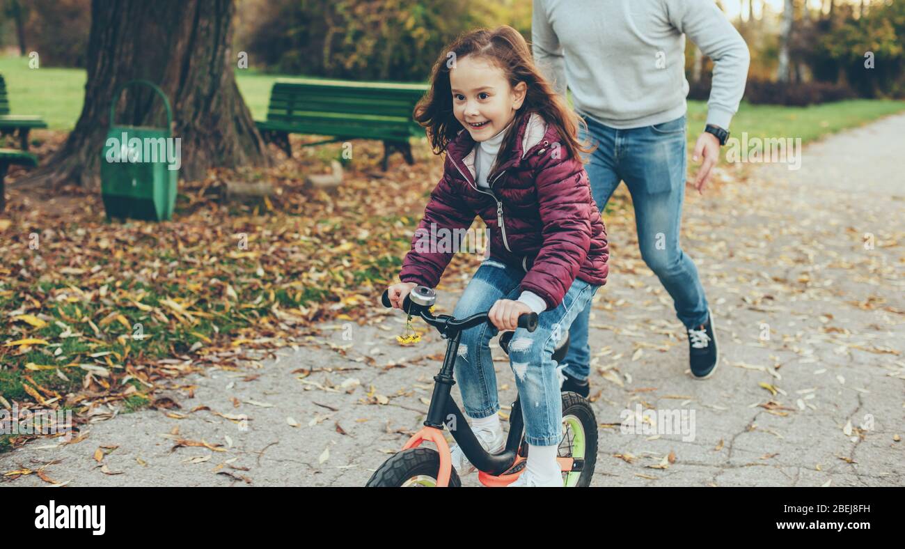 Dad learning bike hi-res stock photography and images - Alamy