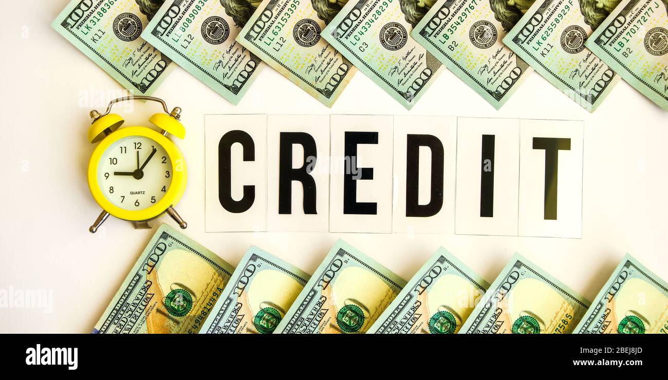 Word CREDIT with one hundred dollar bill on white background Stock ...