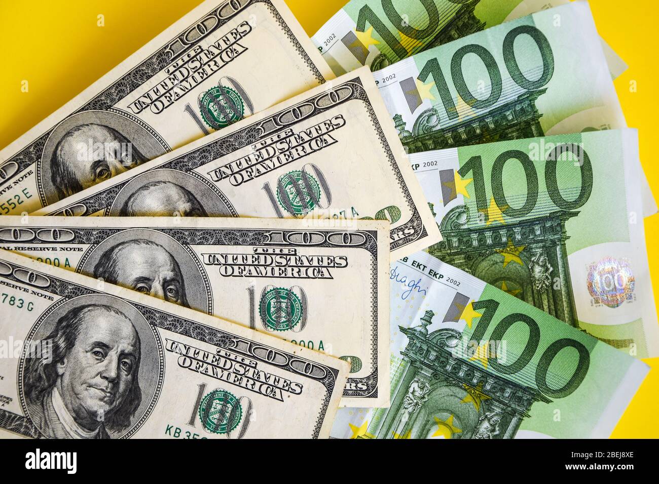 US Dollar and Euro, Euro banknotes close up. Several hundred euro ...