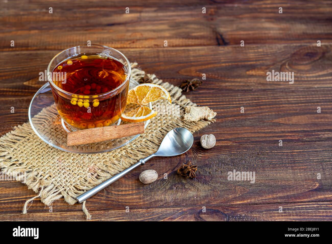 Sea buckthorn tea in a transparent cup. Vitamin drink. Increases ...