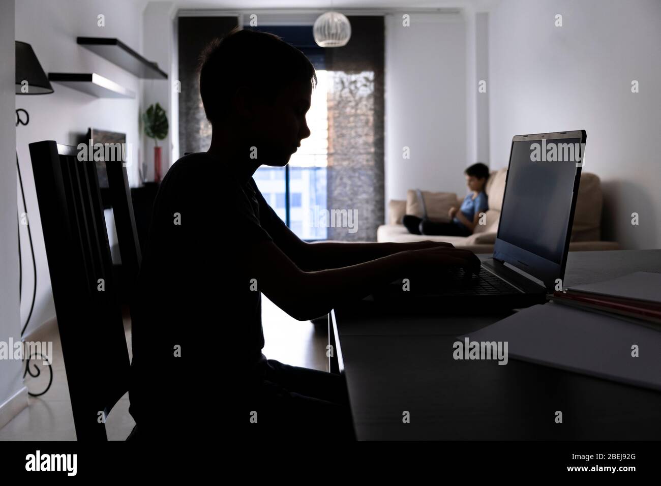 School, distance education, online learnin at home. Children doing ...