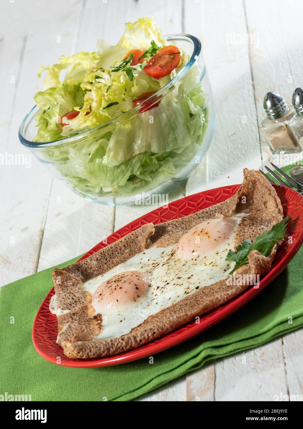 homemade Breton crepe with egg and a green salad Stock Photo - Alamy