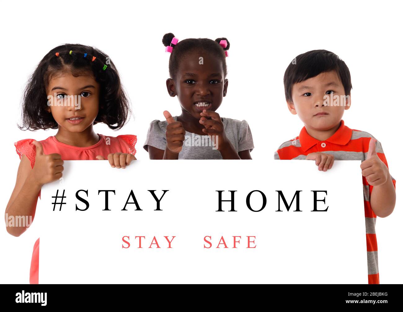 Group of multiracial children shows ''Stay home'' . Concept 2019-nCov ...