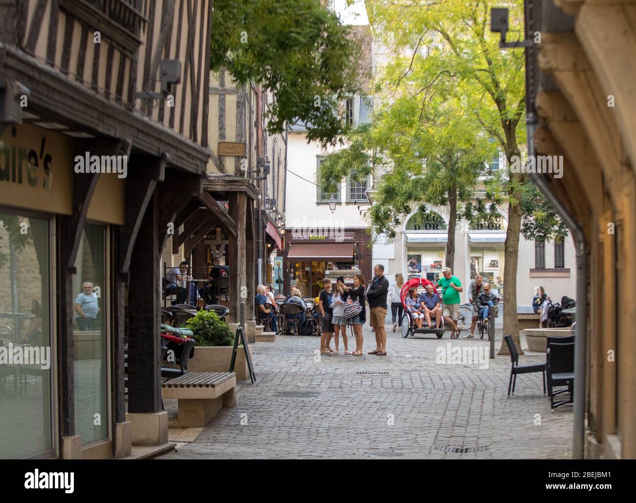 Troyes, France - August 31, 2018: Tourists exploring the narrow streets ...