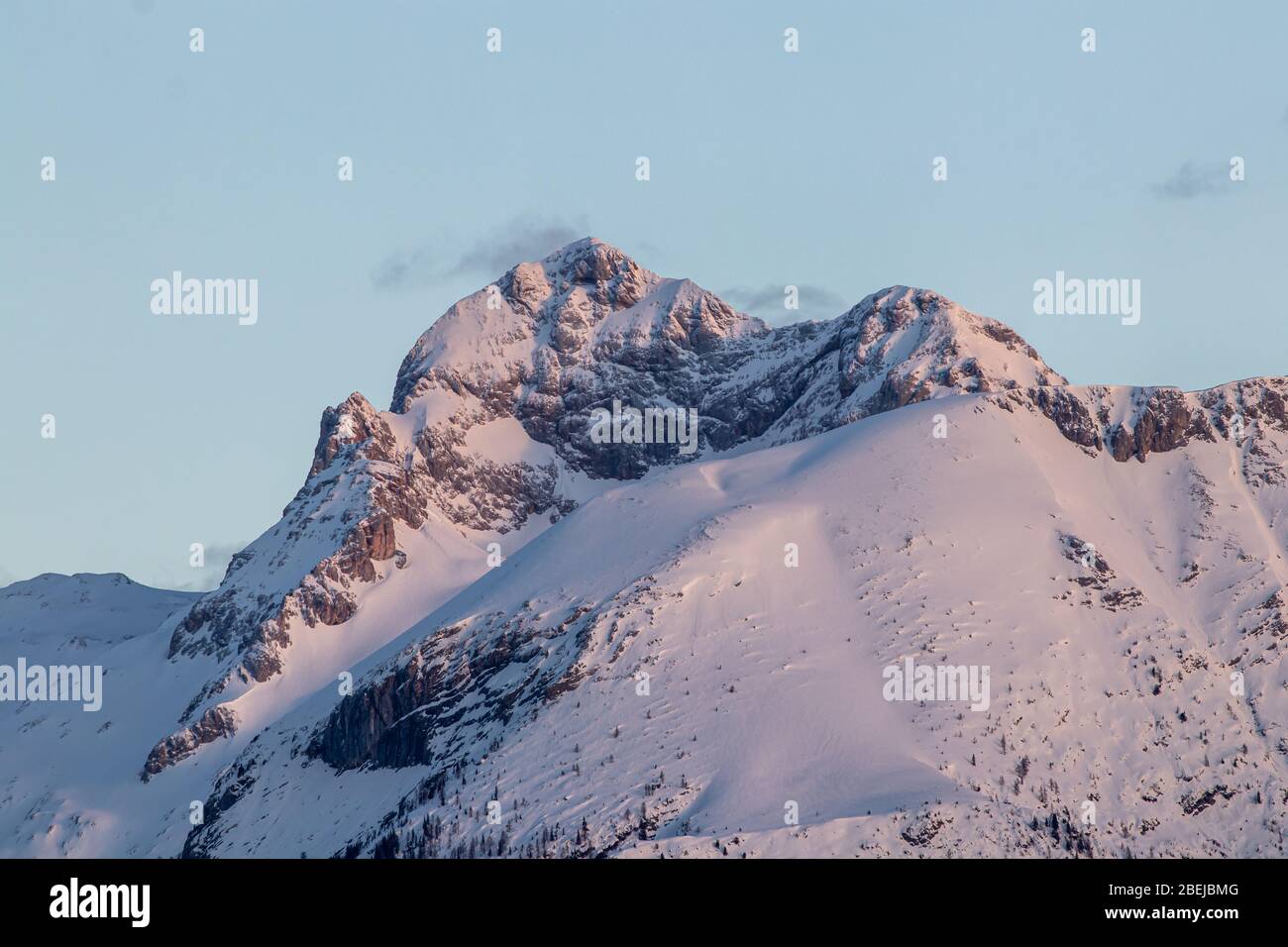 Snow covered Triglav mountain from Bohinj valley Stock Photo - Alamy