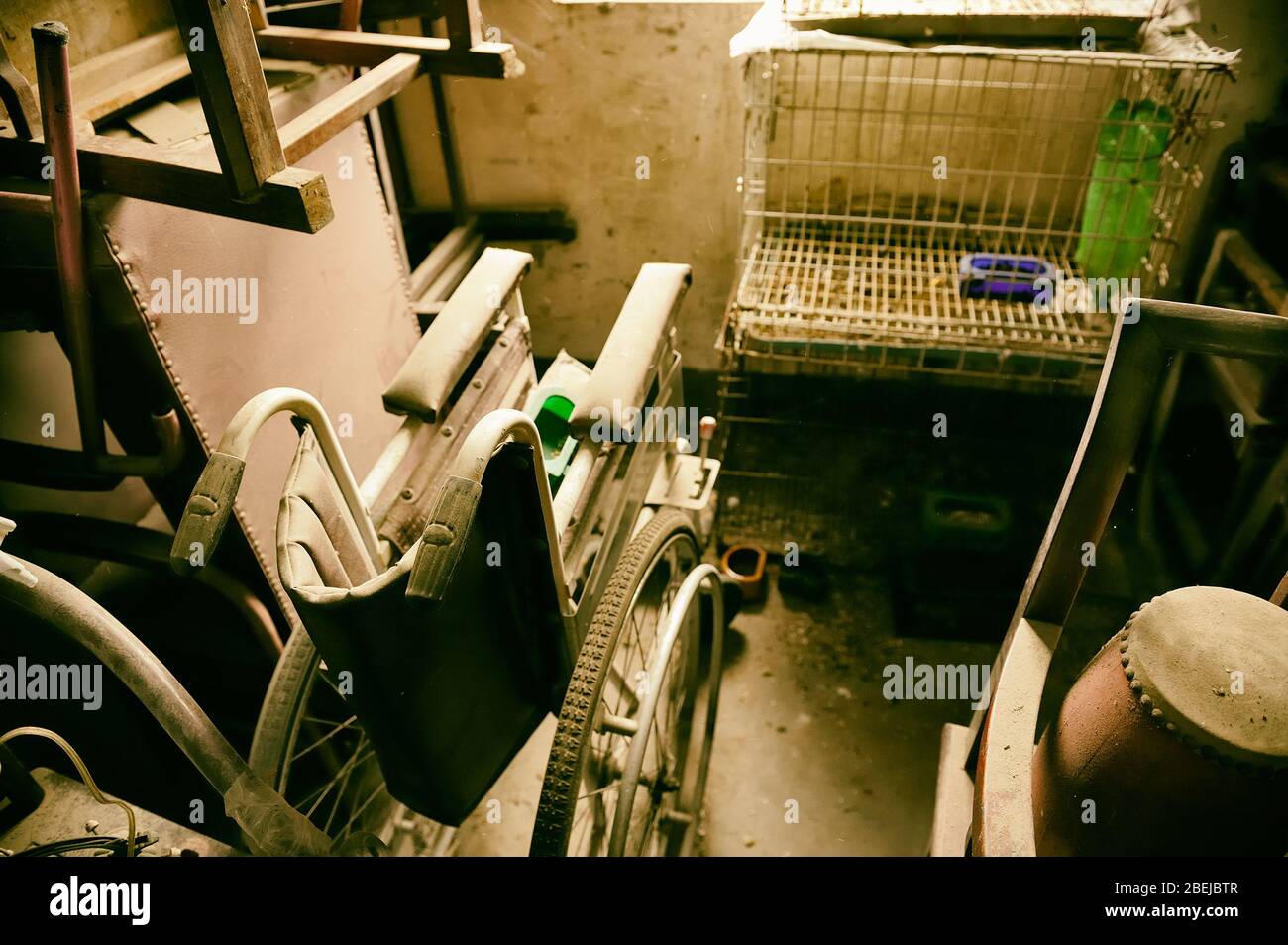 Dirty riddance with old dusty wheelchair abandoned by senior owner ...