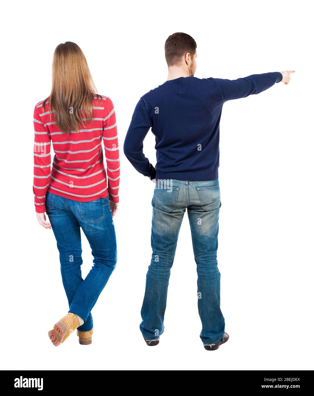 Back view of couple in sweater pointing. Rear view people collection ...