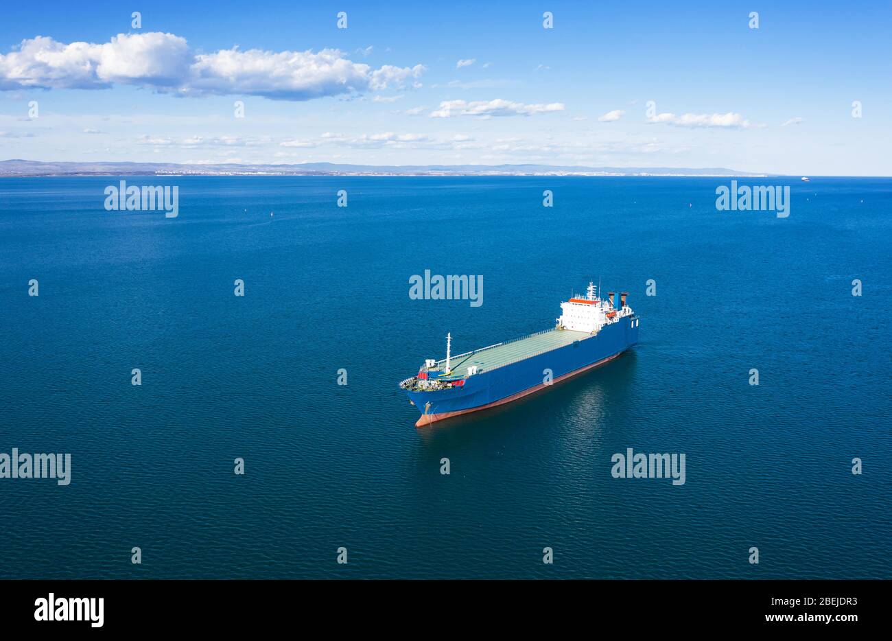 Aerial view of cargo ship in sea Stock Photo - Alamy
