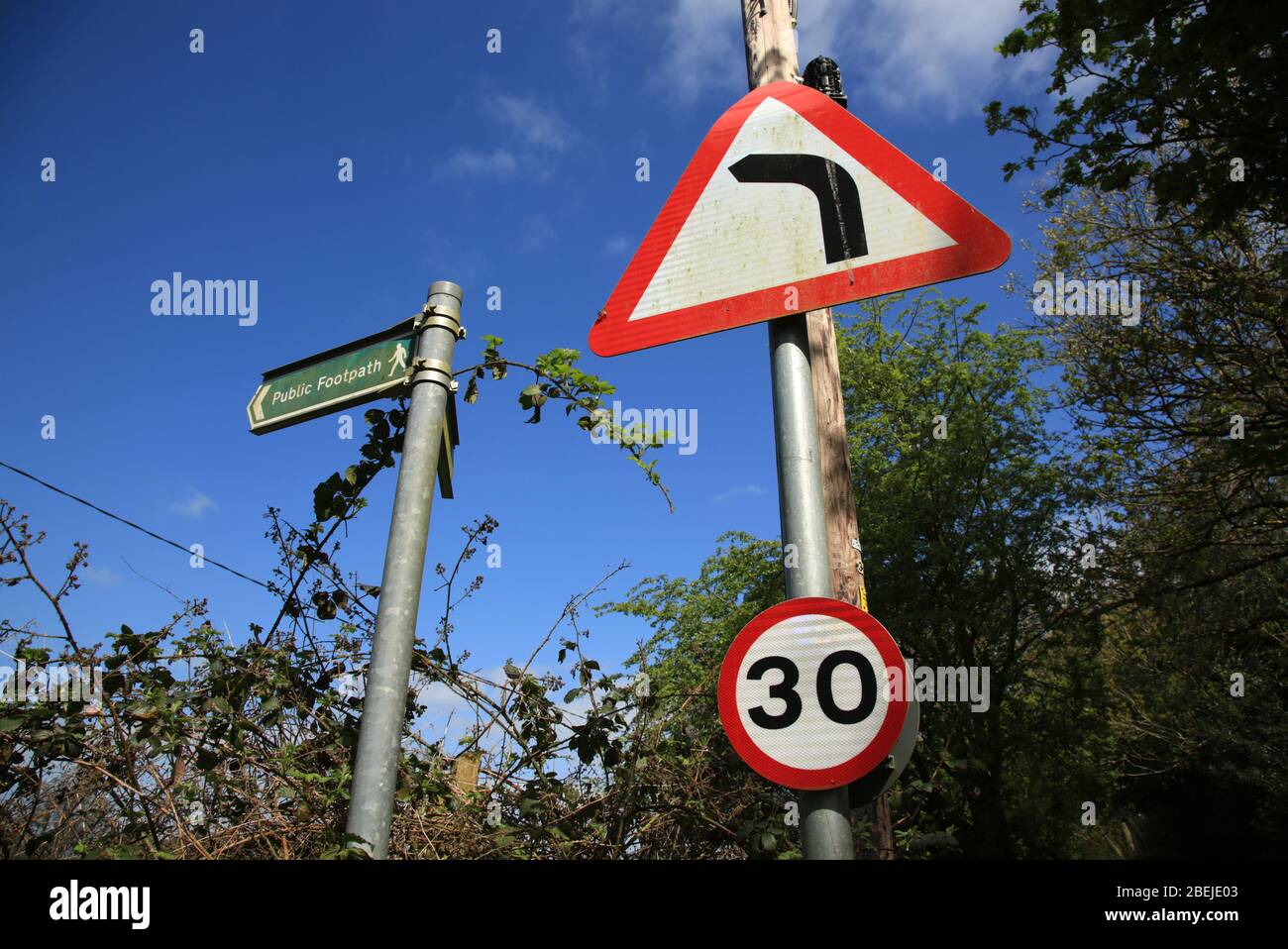 Road signs on an British country lane Stock Photo - Alamy