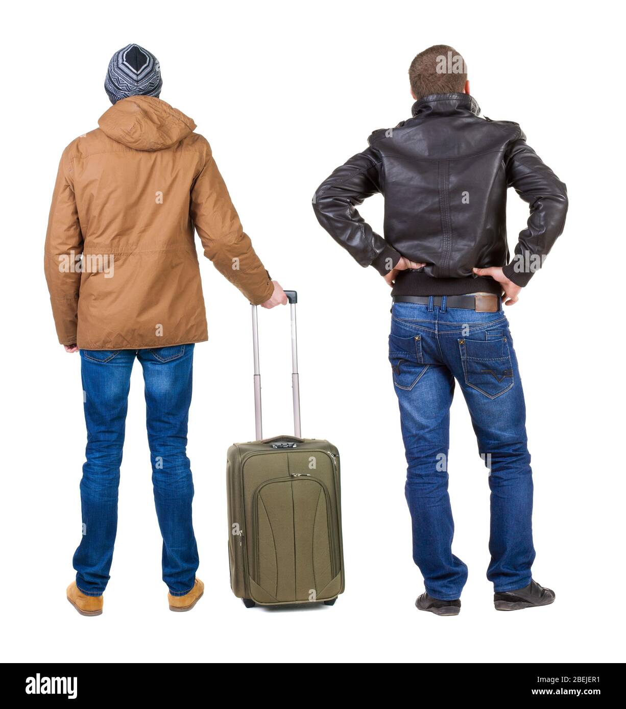 Back view of two man in winter jacket traveling with suitcas. Back view ...