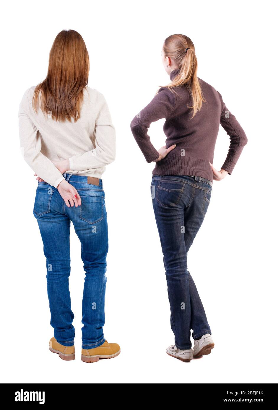 Back view of two woman in sweater. Rear view people collection ...