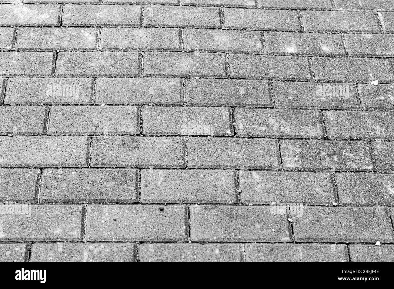 Top view on gray paving stone road. Old pavement of granite texture ...
