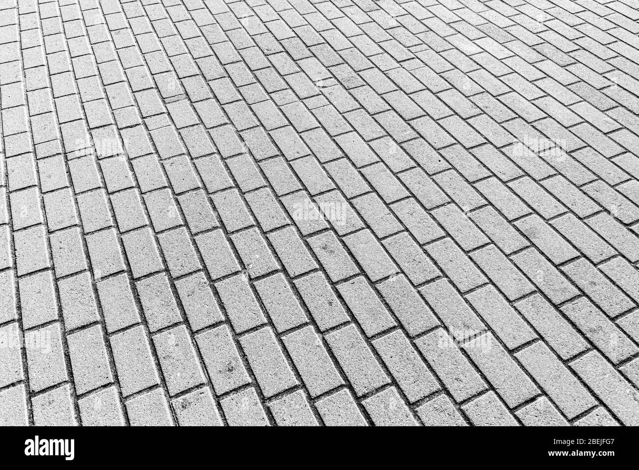 Top view on gray paving stone road. Old pavement of granite texture ...
