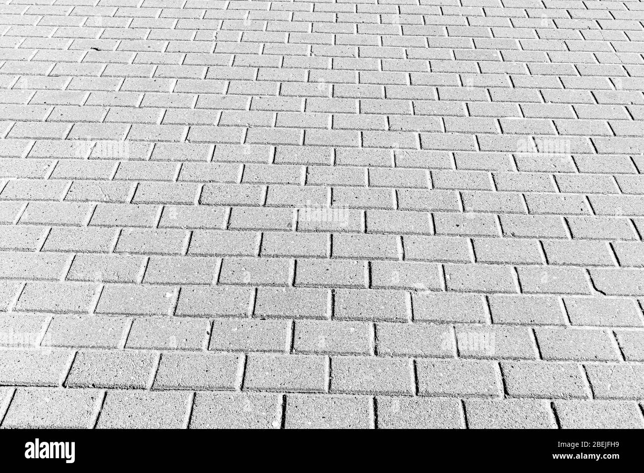 Top view on gray paving stone road. Old pavement of granite texture ...