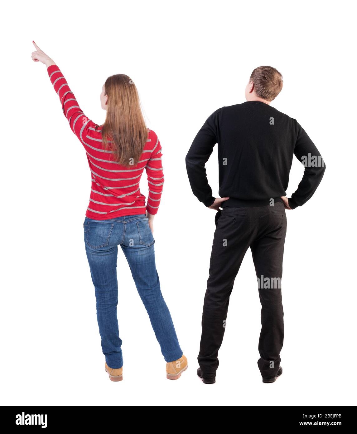Back view of couple in sweater pointing. Rear view people collection ...