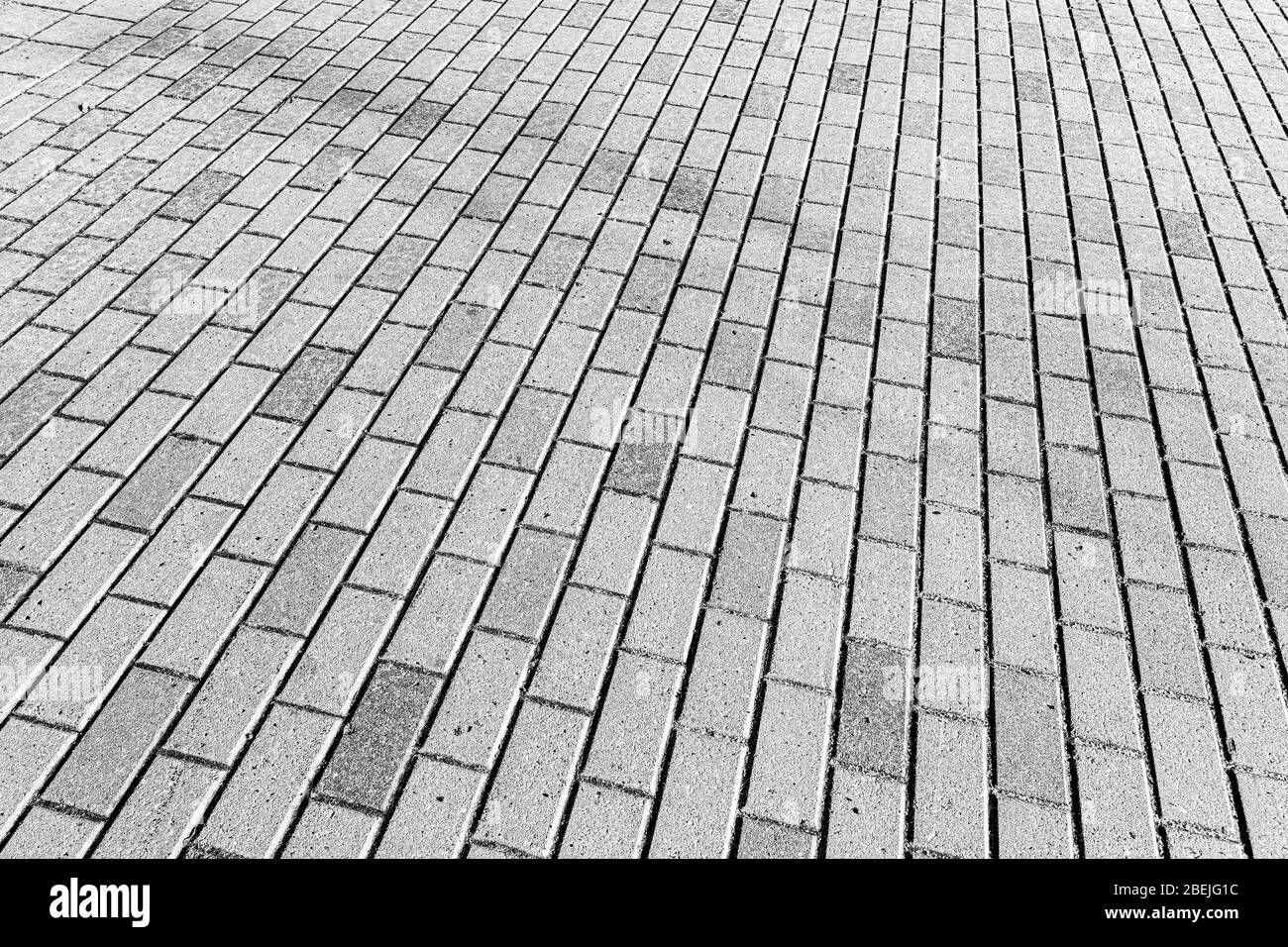 Top view on gray paving stone road. Old pavement of granite texture ...