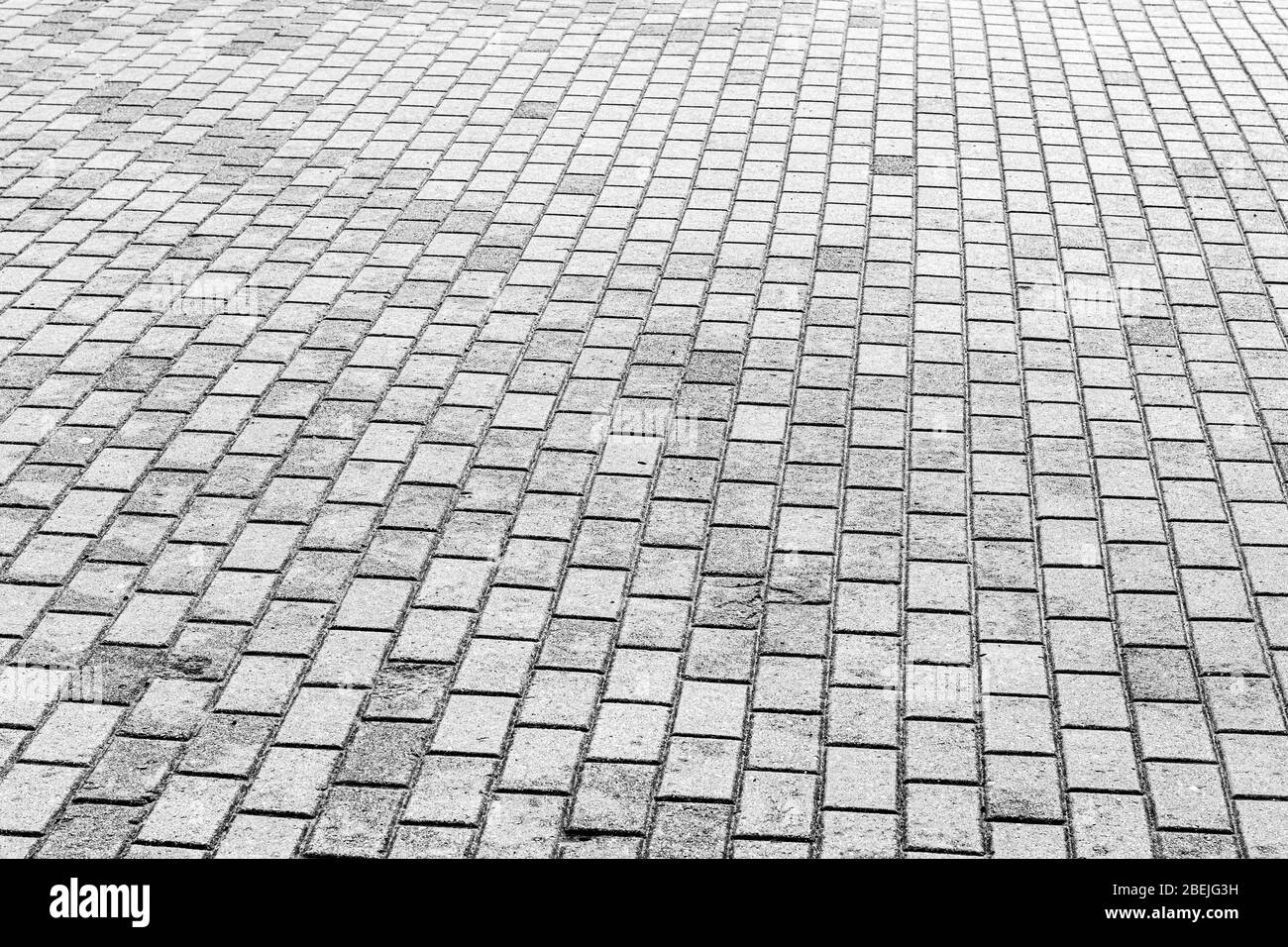 Top view on gray paving stone road. Old pavement of granite texture ...