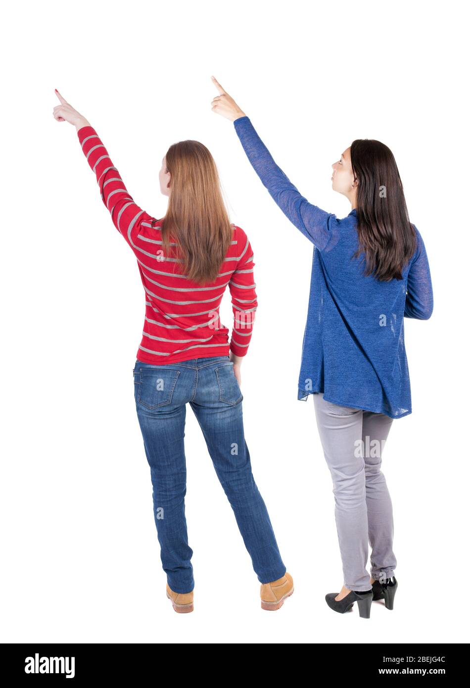 Back view of two pointing girl in sweater. Rear view people collection ...