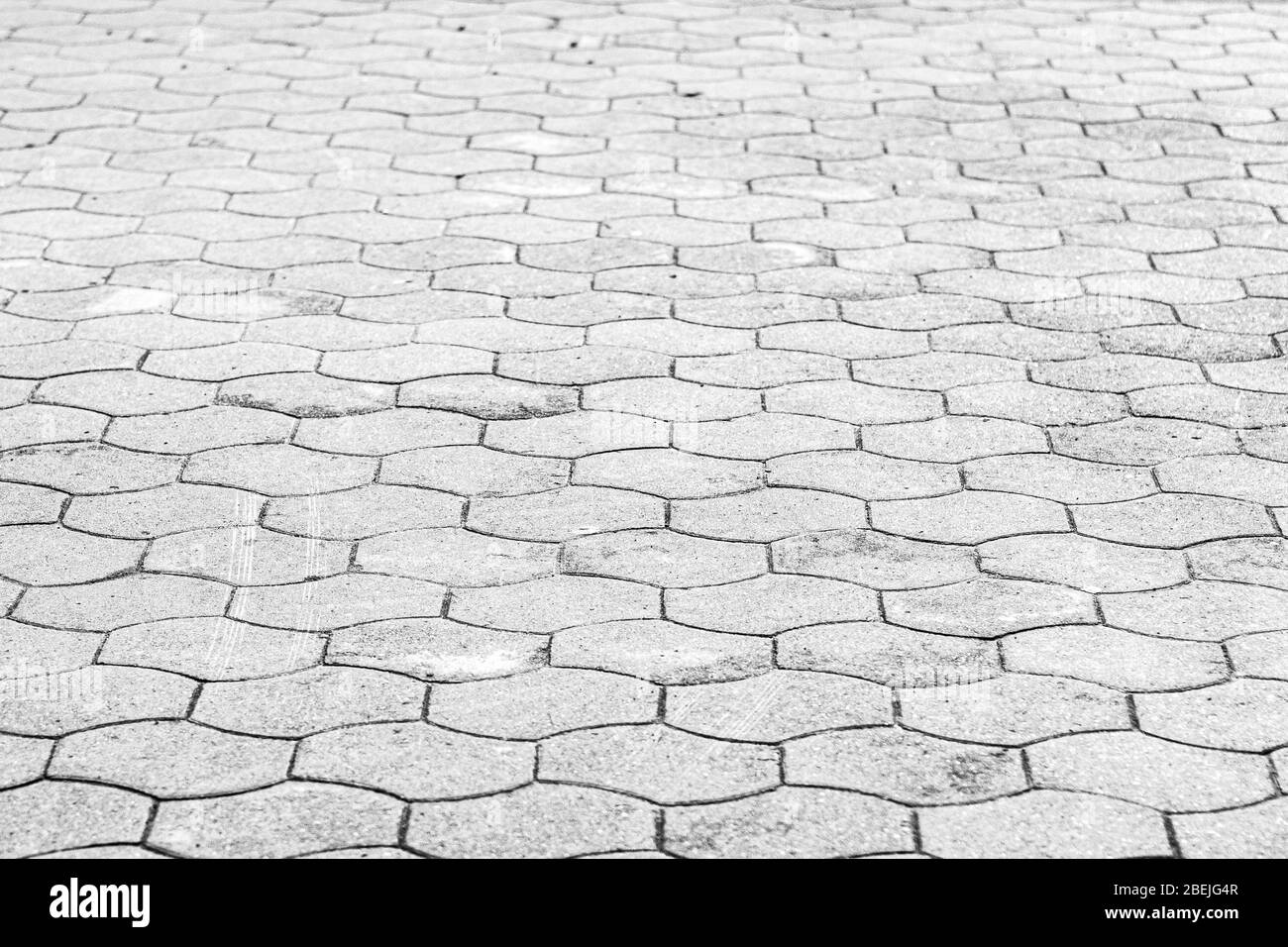 Top view on gray paving stone road. Old pavement of granite texture ...