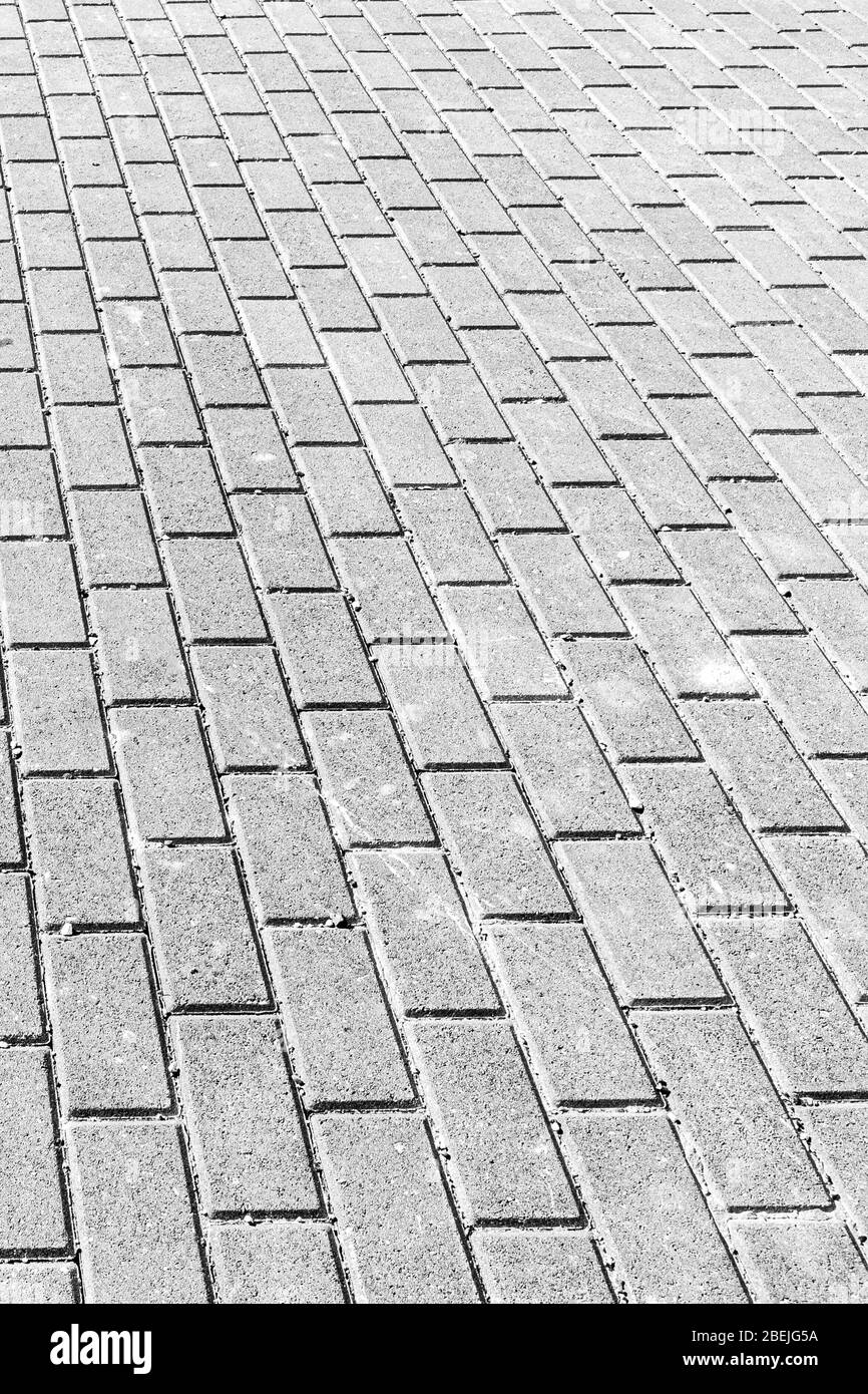 Top view on gray paving stone road. Old pavement of granite texture ...