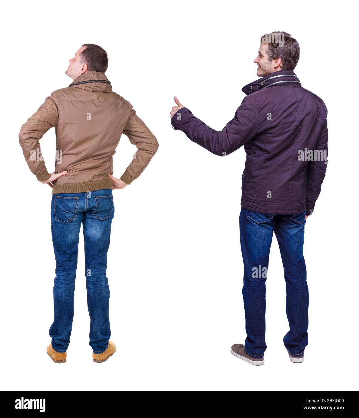 Back view of two man in winter jacket showing thumb up. Rear view ...
