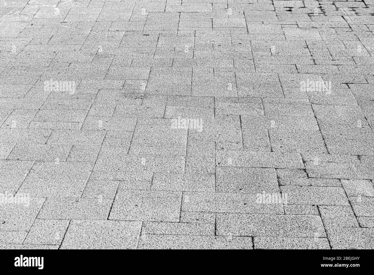 Top view on gray paving stone road. Old pavement of granite texture ...