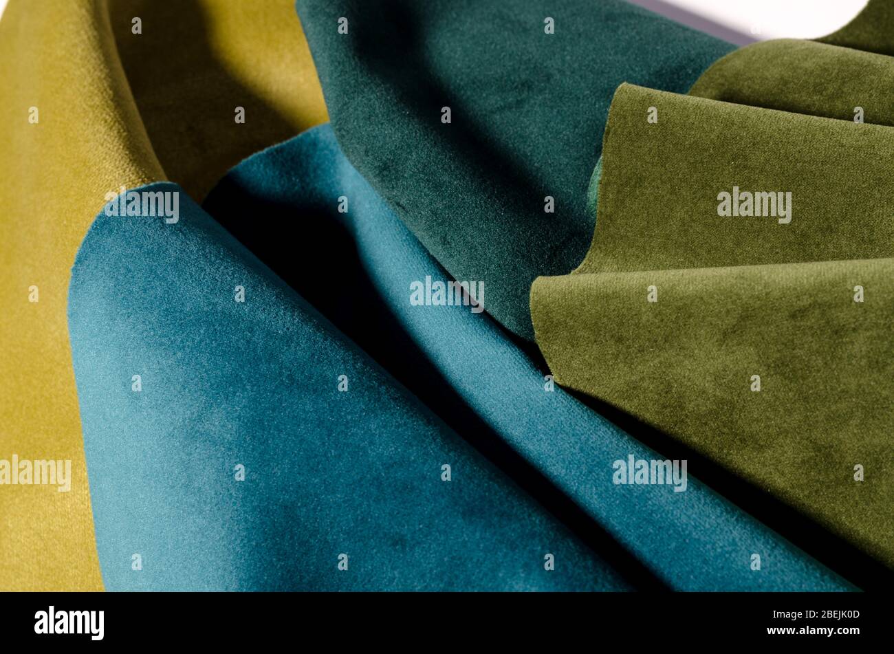 Bright abstract collection of emerald velvet textile samples in green ...