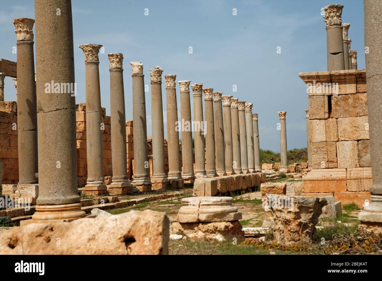 Ancient ruins of Roman theatre at archeological site of Leptis Magna ...