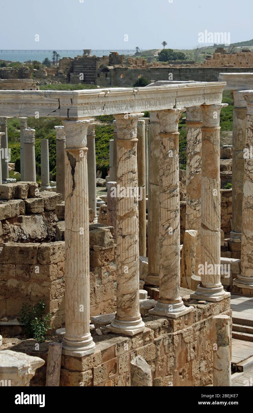 Ancient ruins of Roman theatre at archeological site of Leptis Magna ...
