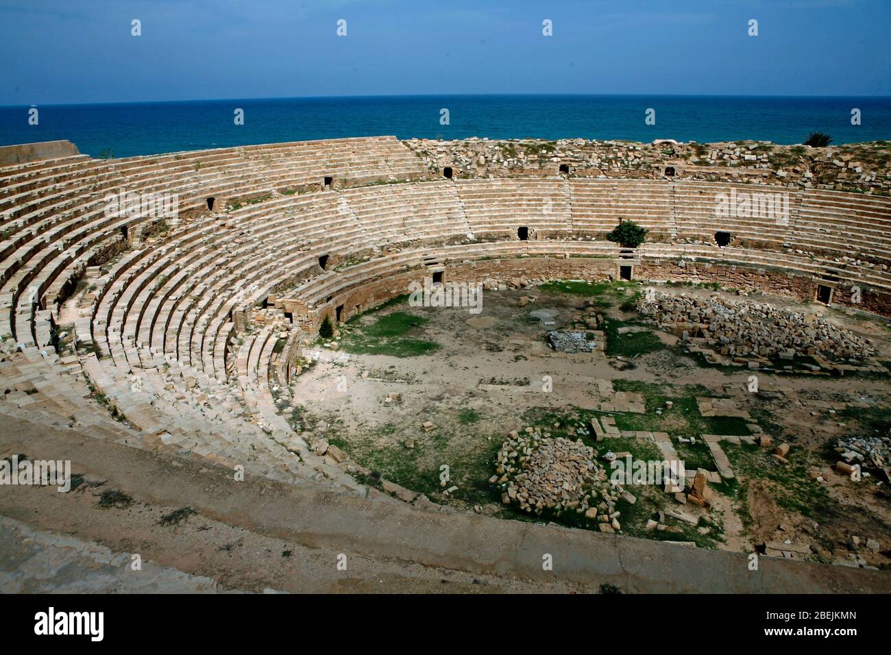 The ruins of Roman Amphitheatre on the Mediterranean seaside at Leptis ...
