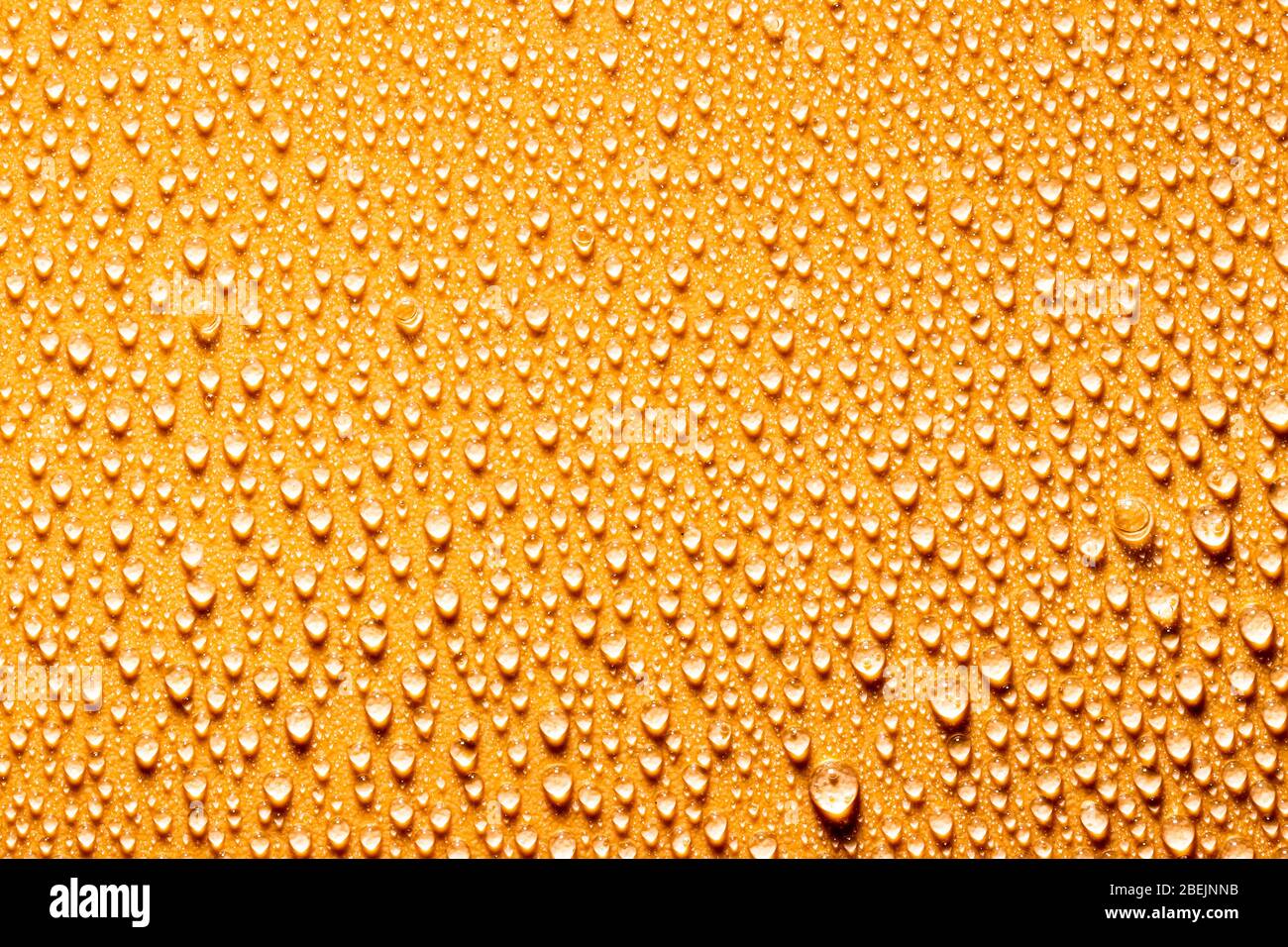 Macro water drops texture on a yellow background. Abstract pattern or ...