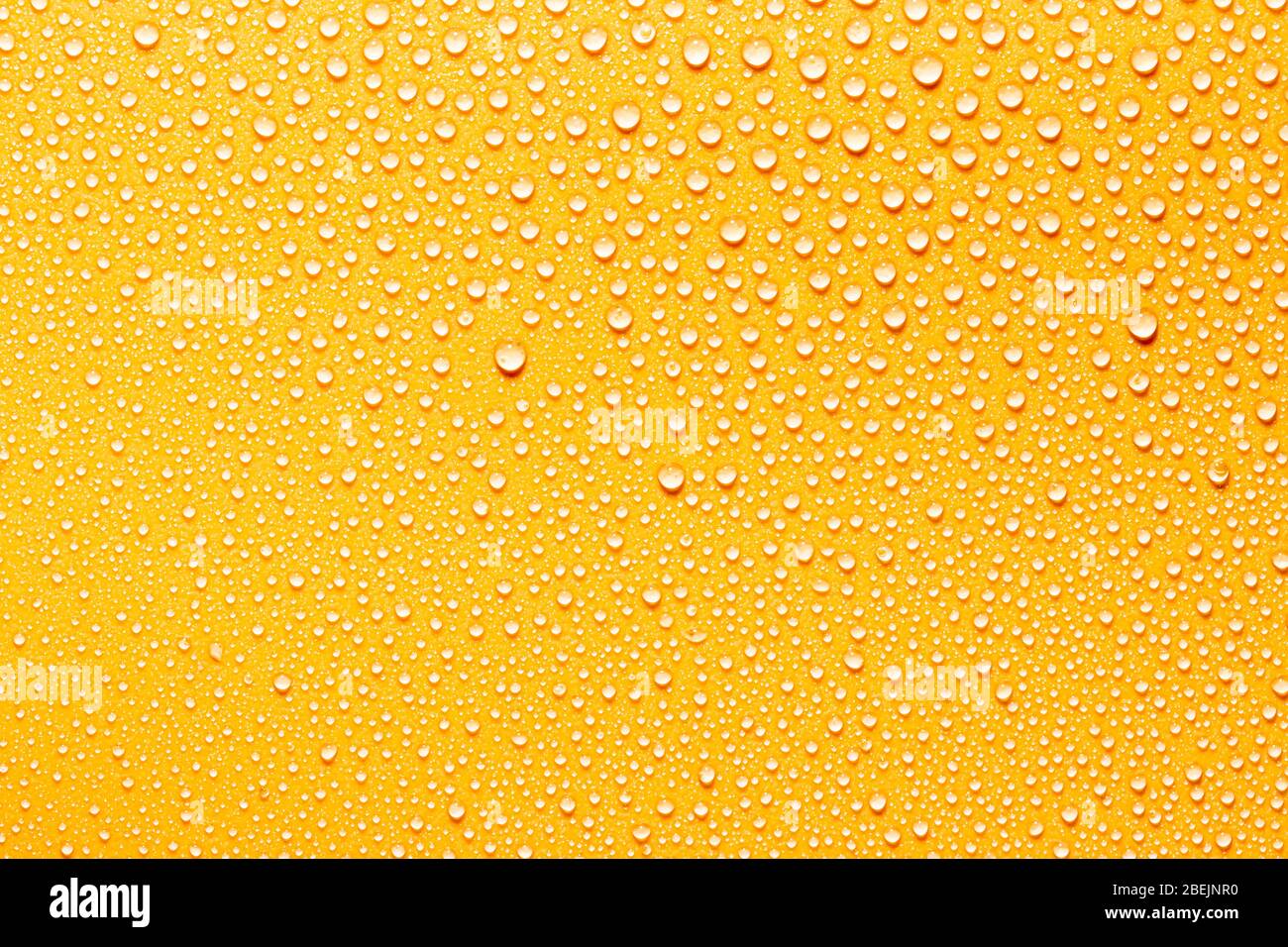 Macro water drops texture on a yellow background. Abstract pattern or ...