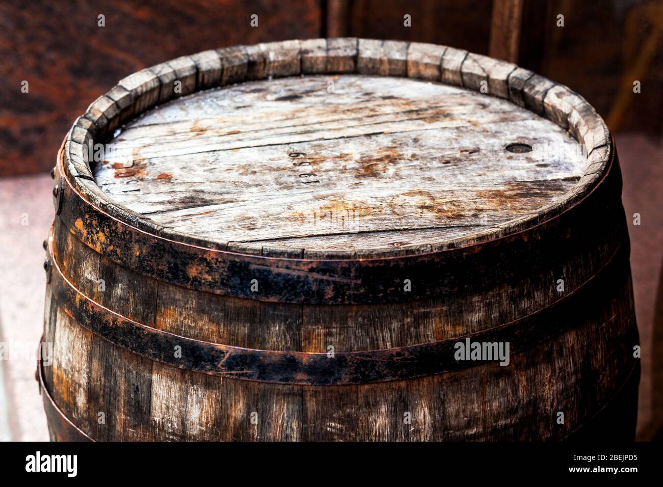 Old rusty barrel 1969 in a cellar room Stock Photo - Alamy