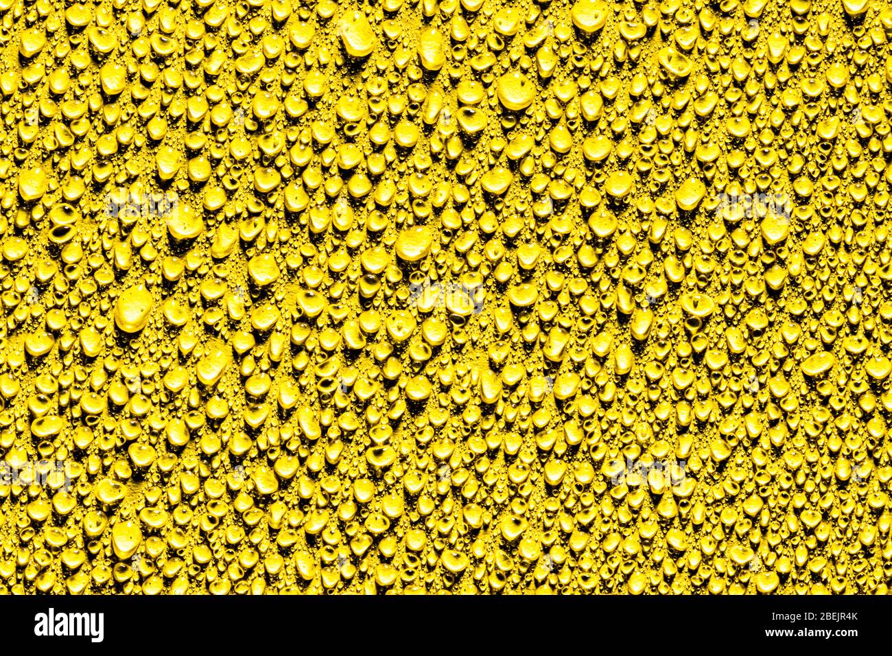Macro water drops texture on a yellow background. Abstract pattern or ...