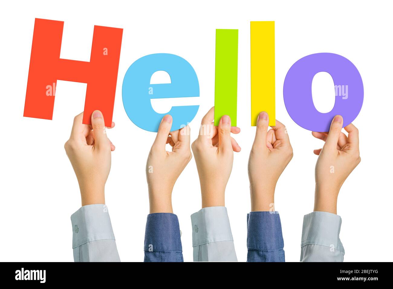 Multiple hands holding colored alphabets to form the word Hello on ...