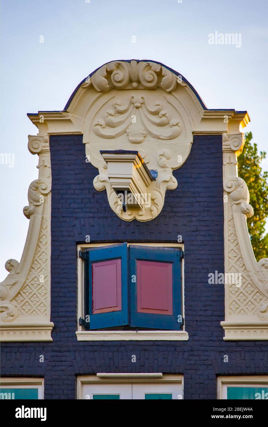 Roof with windows in Amsterdam buildings Stock Photo - Alamy