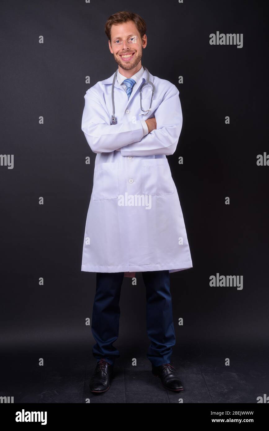 Happy smiling caucasian male doctor hi-res stock photography and images ...