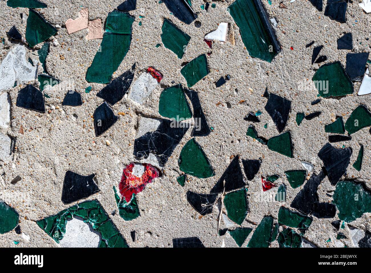 Concrete wall with glass inserts texture. Abstract background for ...