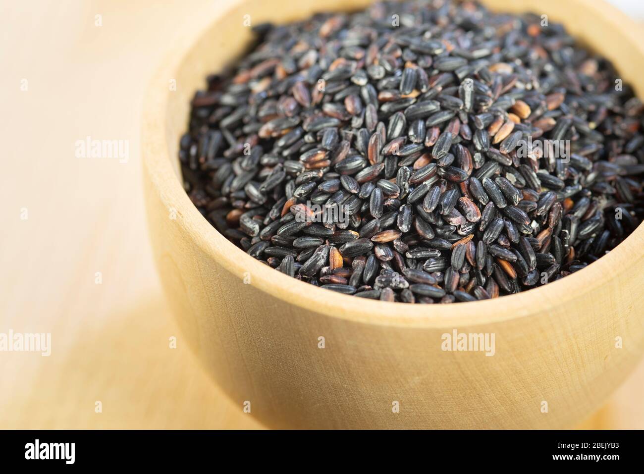 Wooden cup uncooked rice hi-res stock photography and images - Alamy