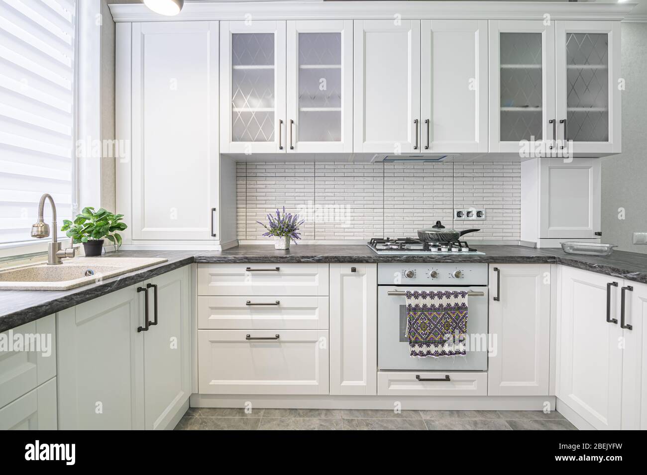 Modern white kitchen interior Stock Photo - Alamy