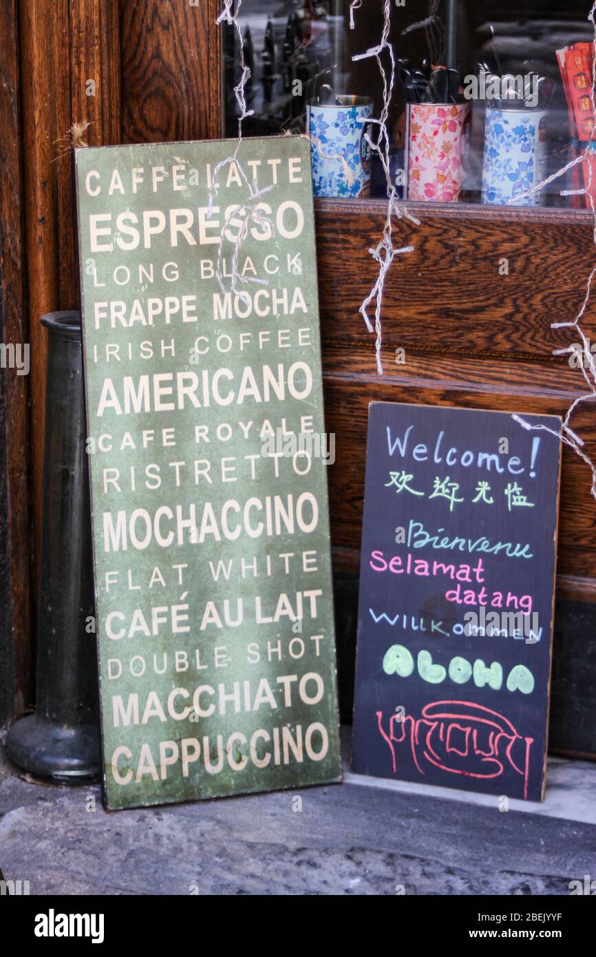 Café menu on a sidewalk sign Stock Photo - Alamy