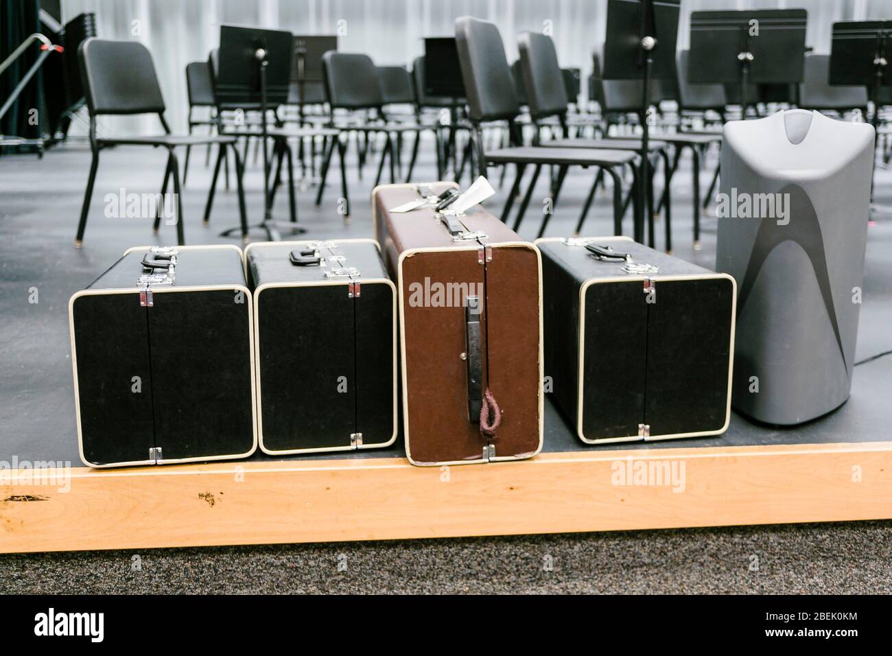 four musical instruments in their cases waiting to be disbursed Stock ...