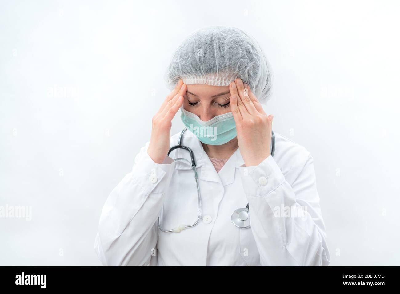 Tired doctor nurse after work in a laboratory clinic with a stethoscope ...