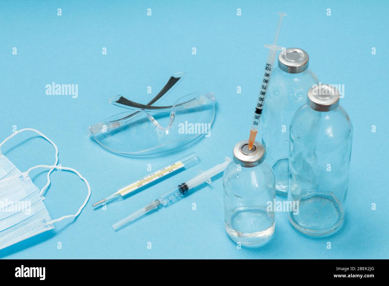 Protective glasses, glass bottles for liquid medicine, a medical mask ...