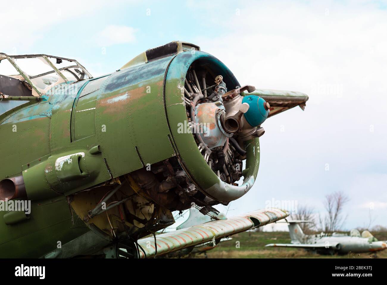 Old destroyed Soviet abandoned military airplanes in the field in ...