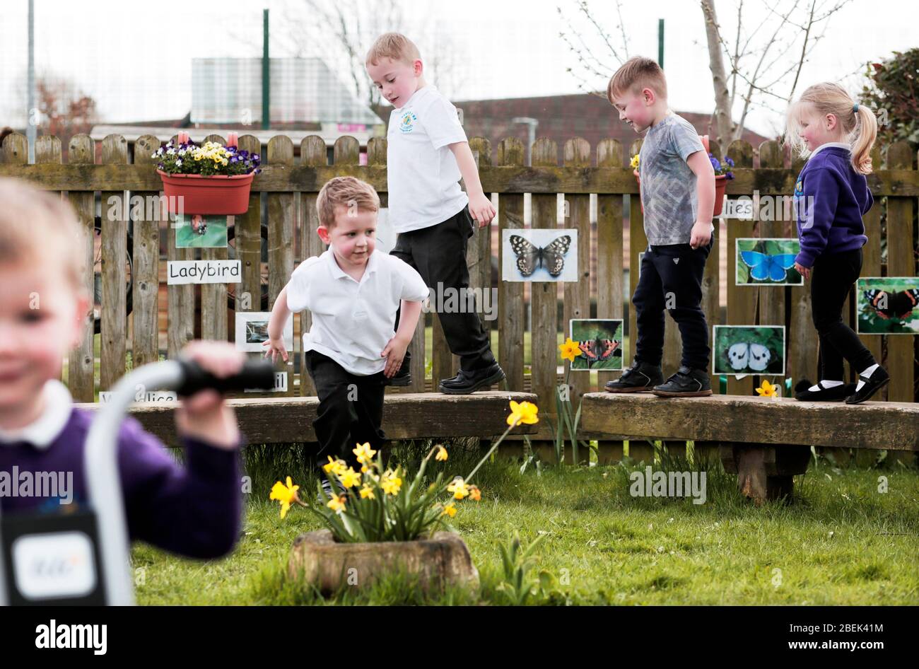 School children playing outside uniform hi-res stock photography and ...